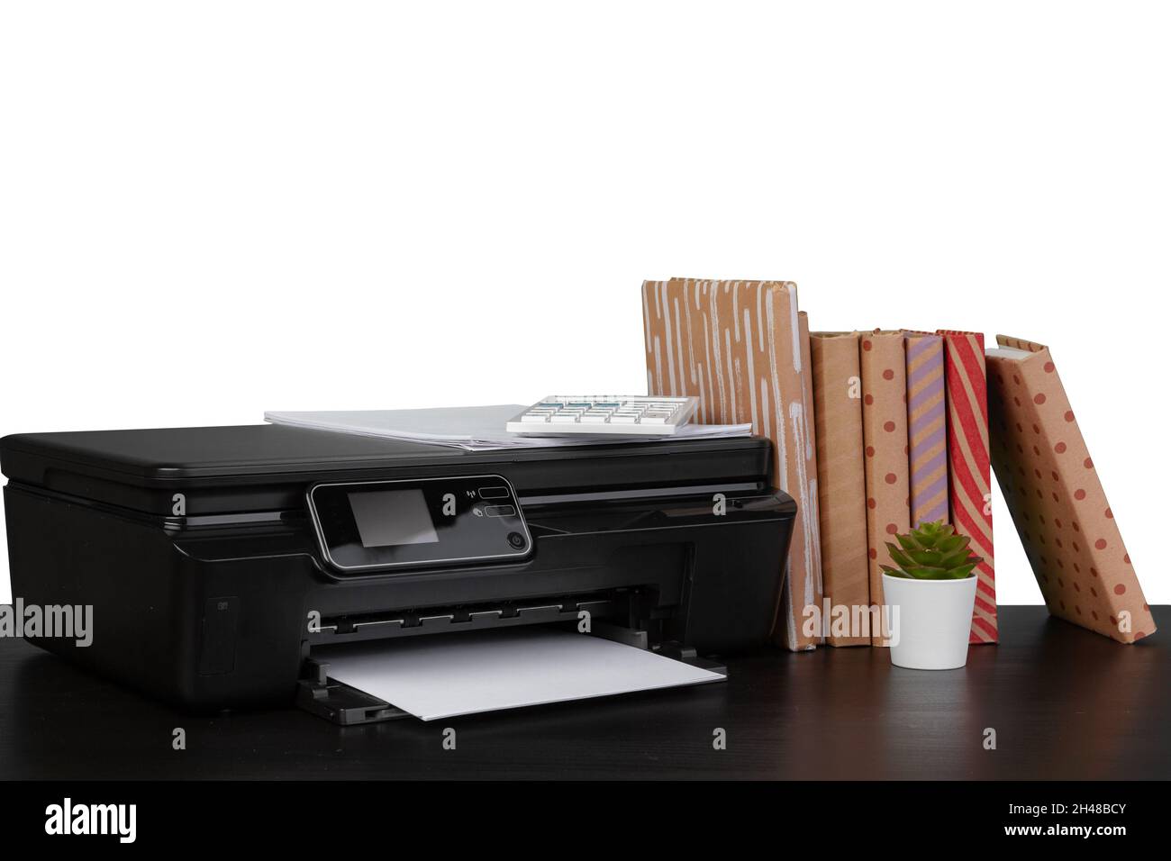 Office table with laser printer and books against white background ...