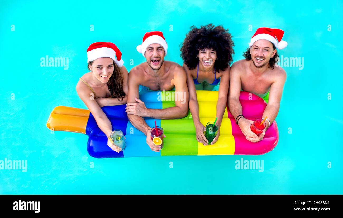 merry christmas! happy diverse group of friends portrait wearing xmas ...