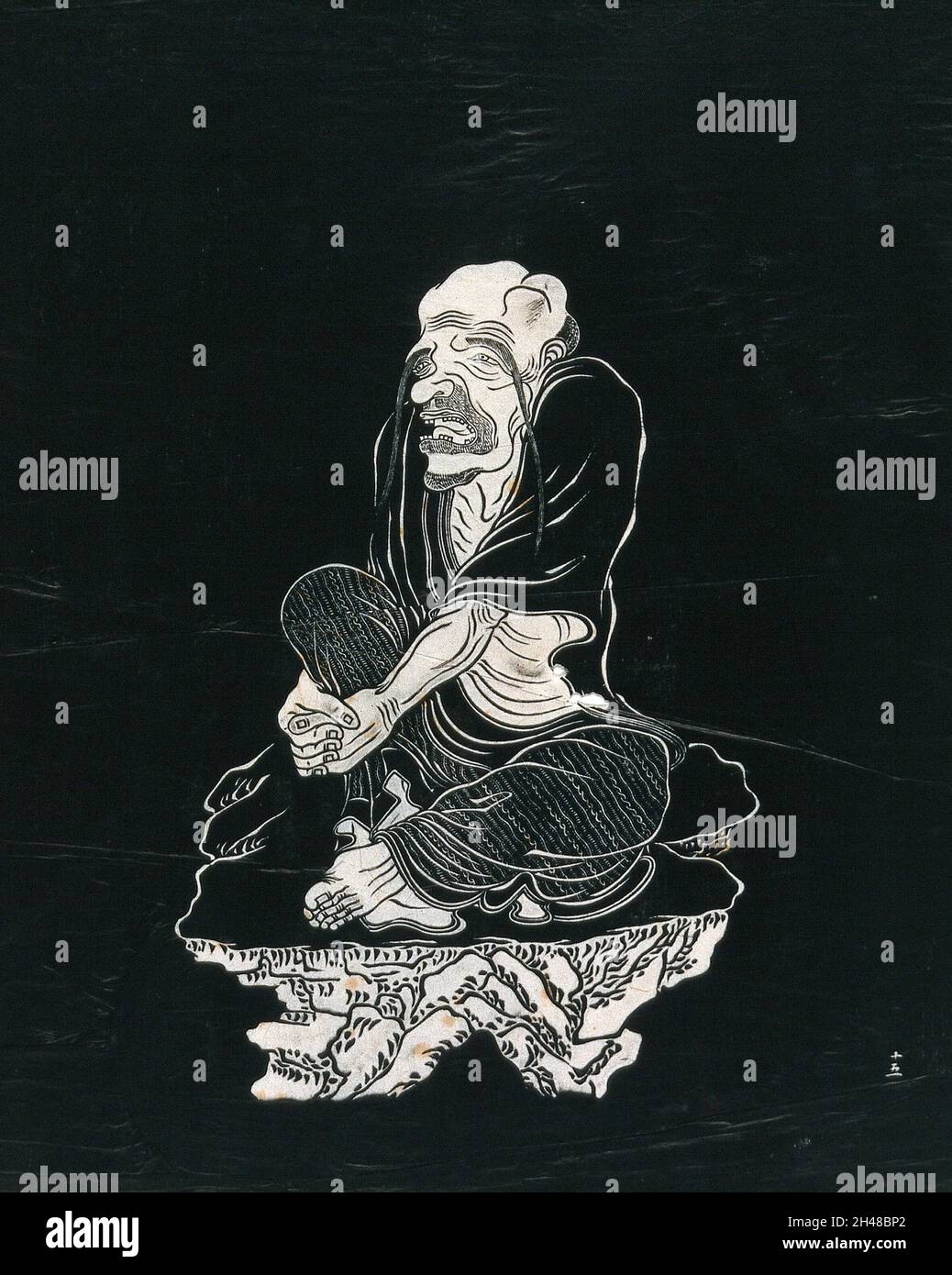 A Lohan (disciple of Buddha), with very long eyebrows, seated on a rock ...