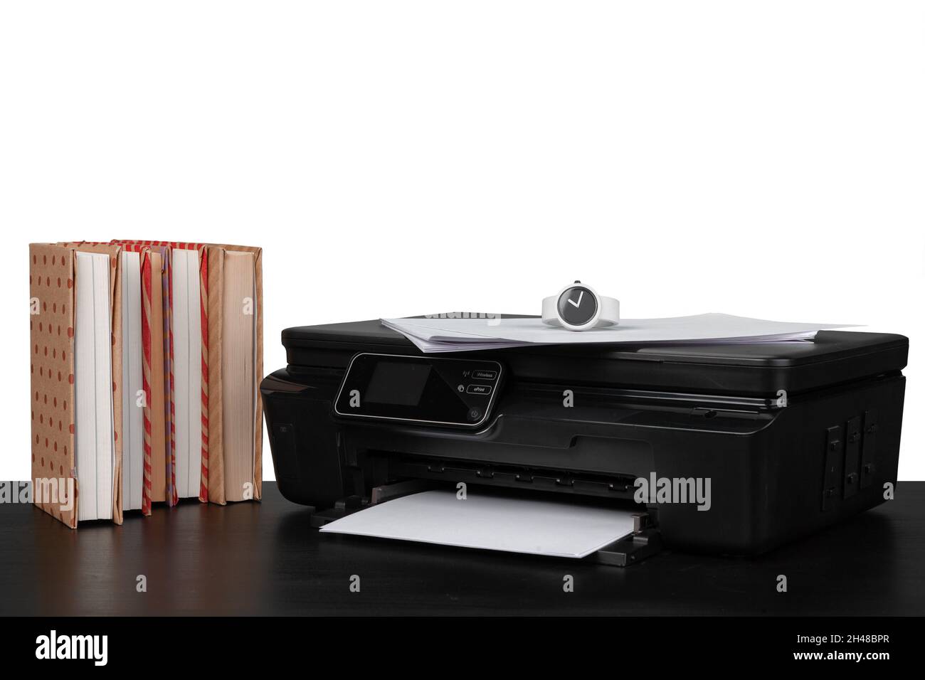 Working table with printer and stacked books on white abckground Stock ...