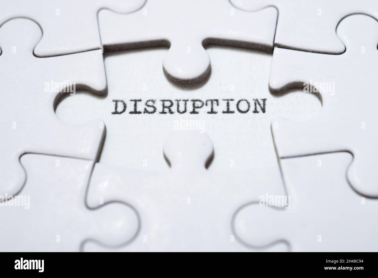 The word disruption written with a typewriter Stock Photo - Alamy