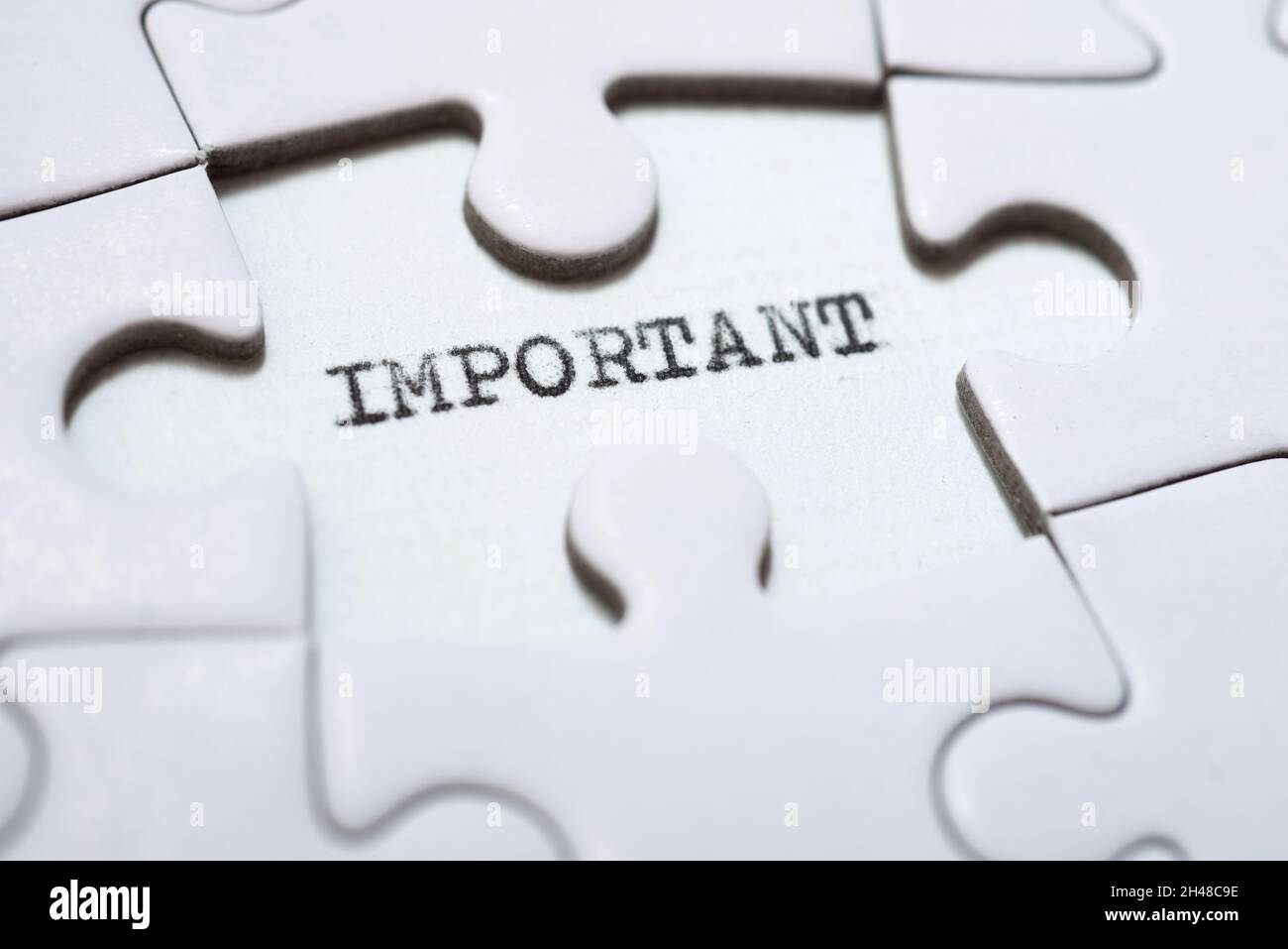 The word important written with a typewriter Stock Photo - Alamy