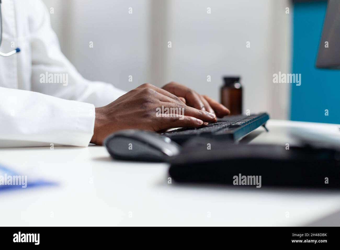 Man analyzing documents typing on hi-res stock photography and images ...