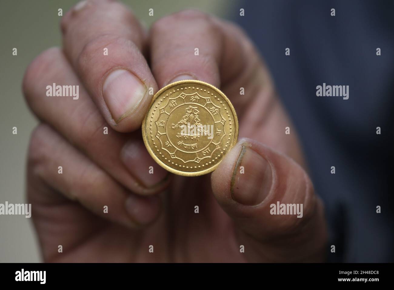 Kathmandu, NE, Nepal. 1st Nov, 2021. People display the silver and gold ...