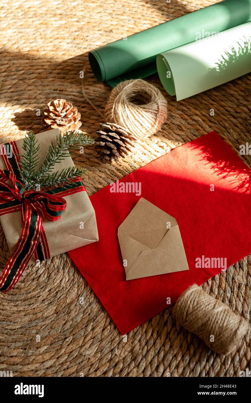 Process of preparing presents for Christmas, decorations. Paper and box ...