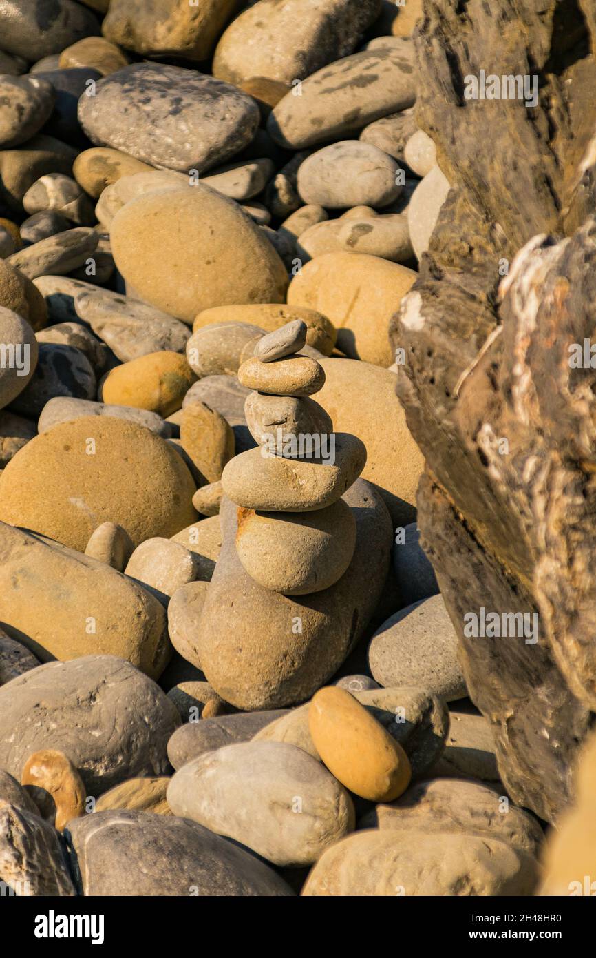 Vertical closeup shot of the stack of pebbles for backgrounds - balance ...