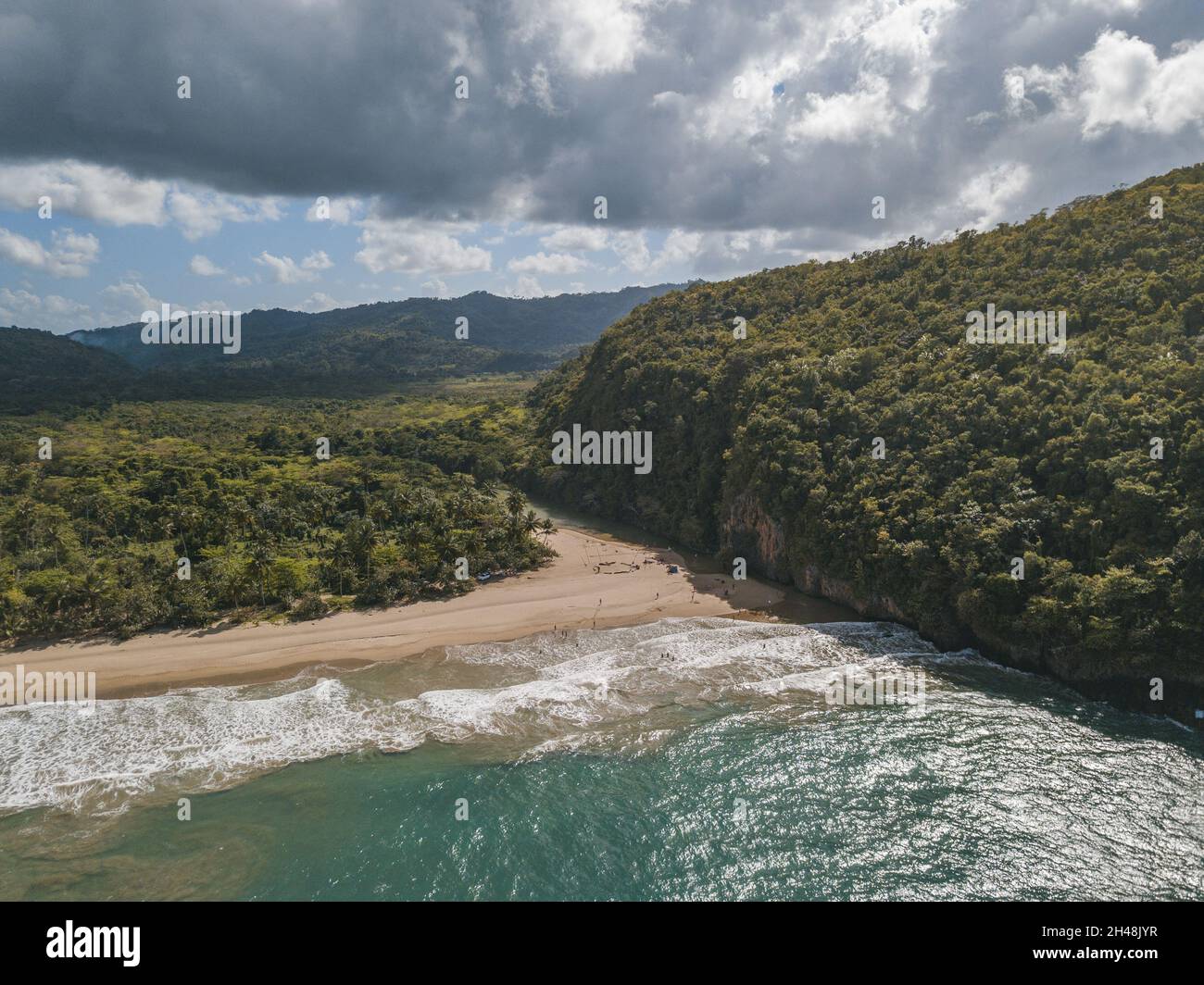 Landscape of El Valle Beach surrounded by greenery and sea in Samana ...