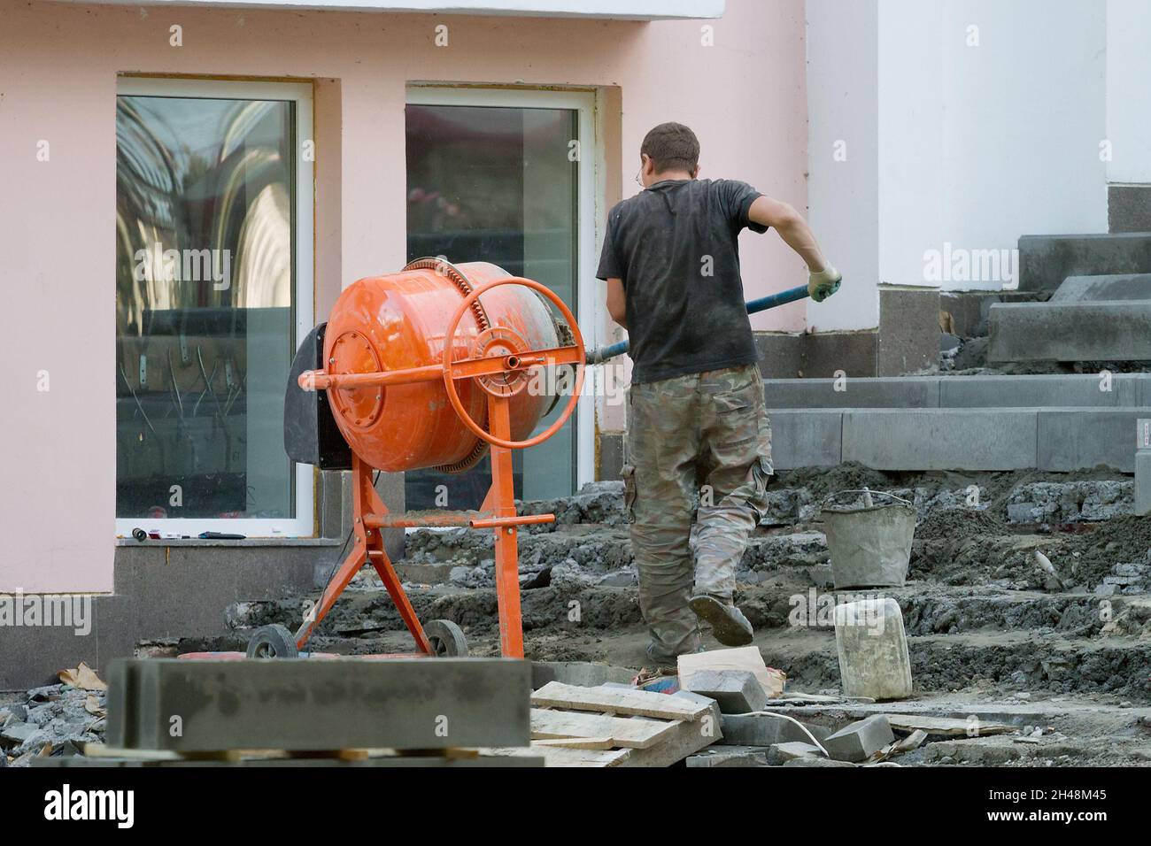 22.08.2014. Russia. Moscow. Construction works. Concrete worker at a ...