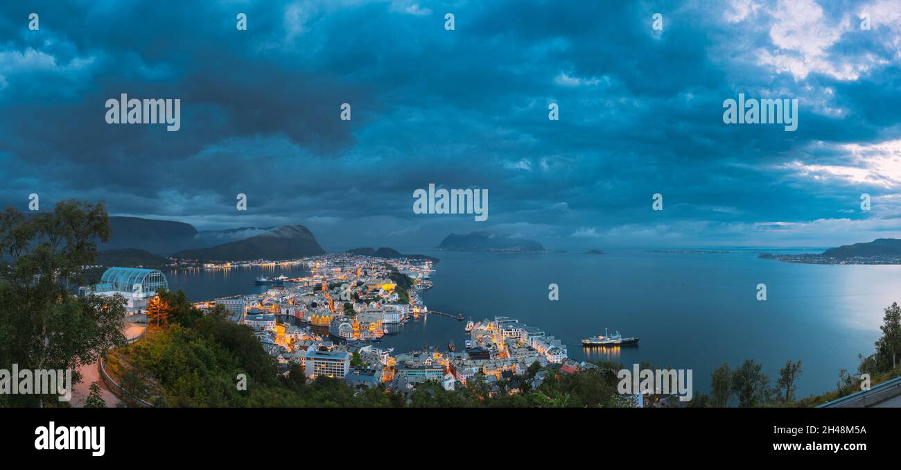 Alesund, Norway. Night View Of Alesund Skyline Cityscape. Historical ...