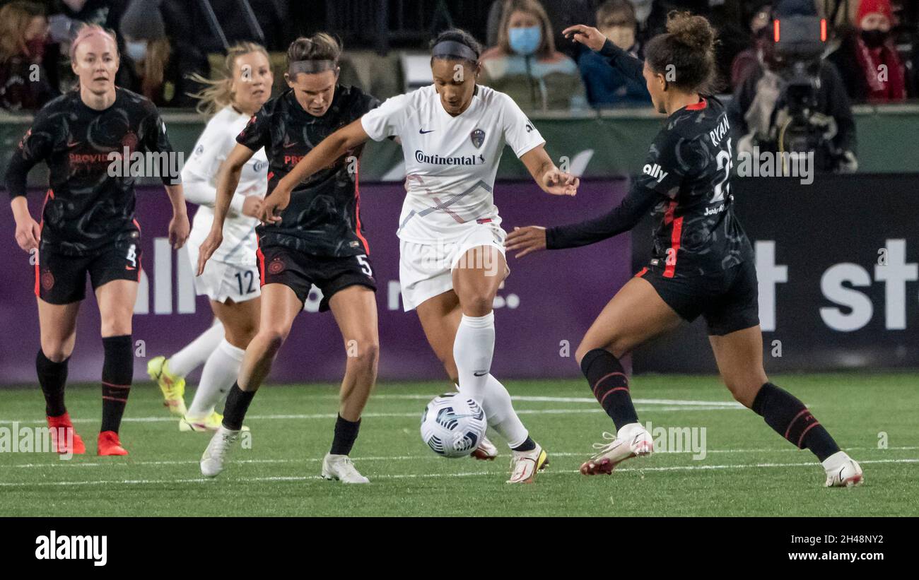 Portland, USA. 30th Oct, 2021. Courage Lynn Williams tries to dribble ...