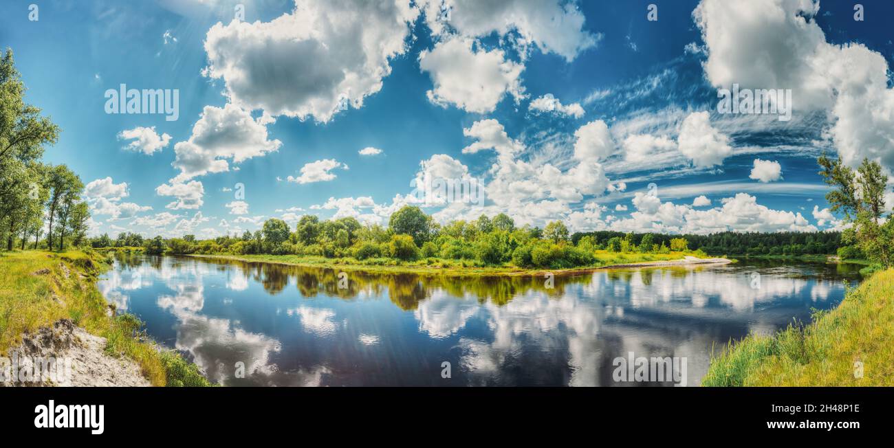 River Landscape With Reflections Of Clouds And Woods In Water. S Stock ...