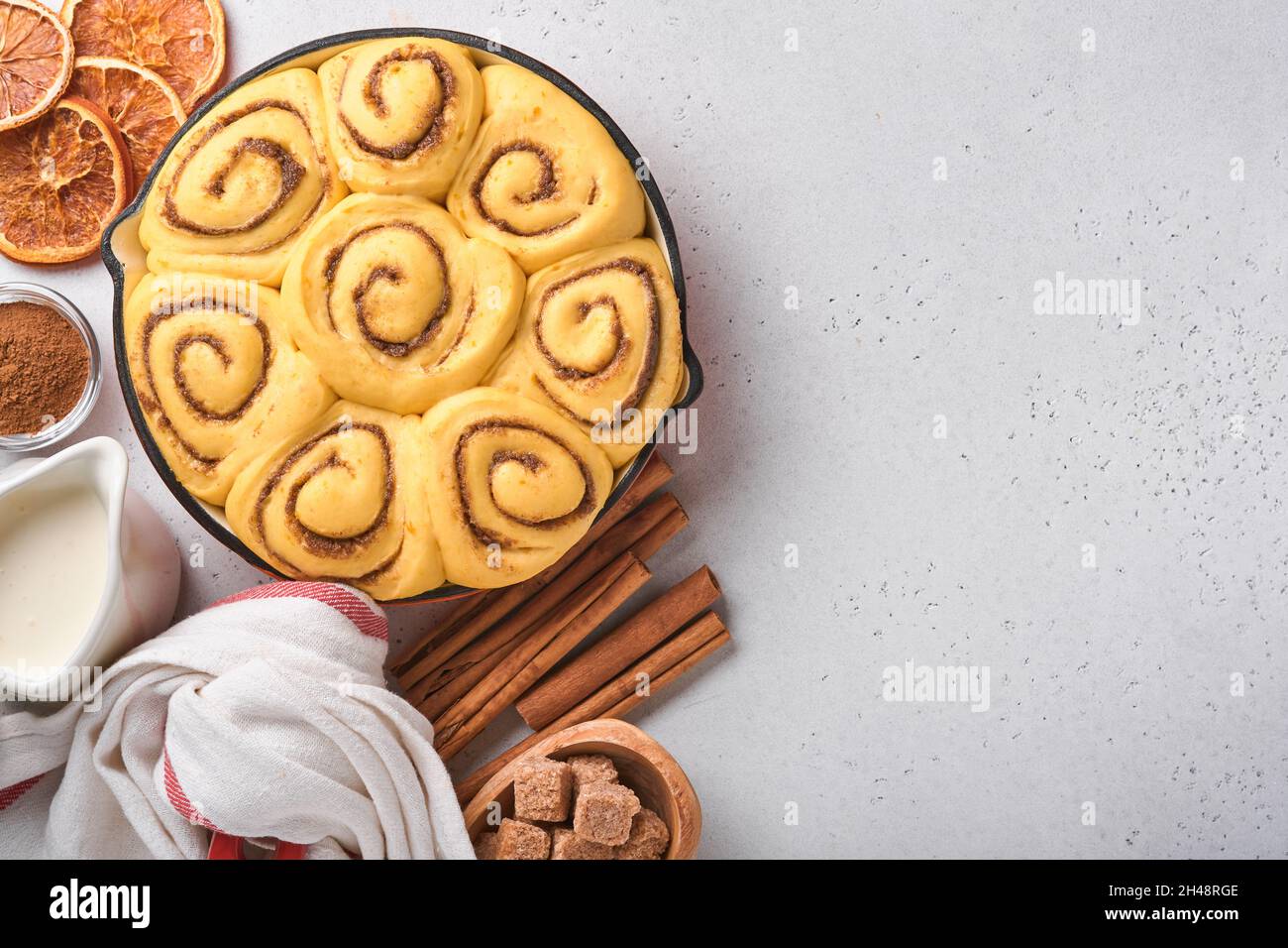 Cinnamon rolls or cinnabon homemade recipe raw dough preparation sweet ...