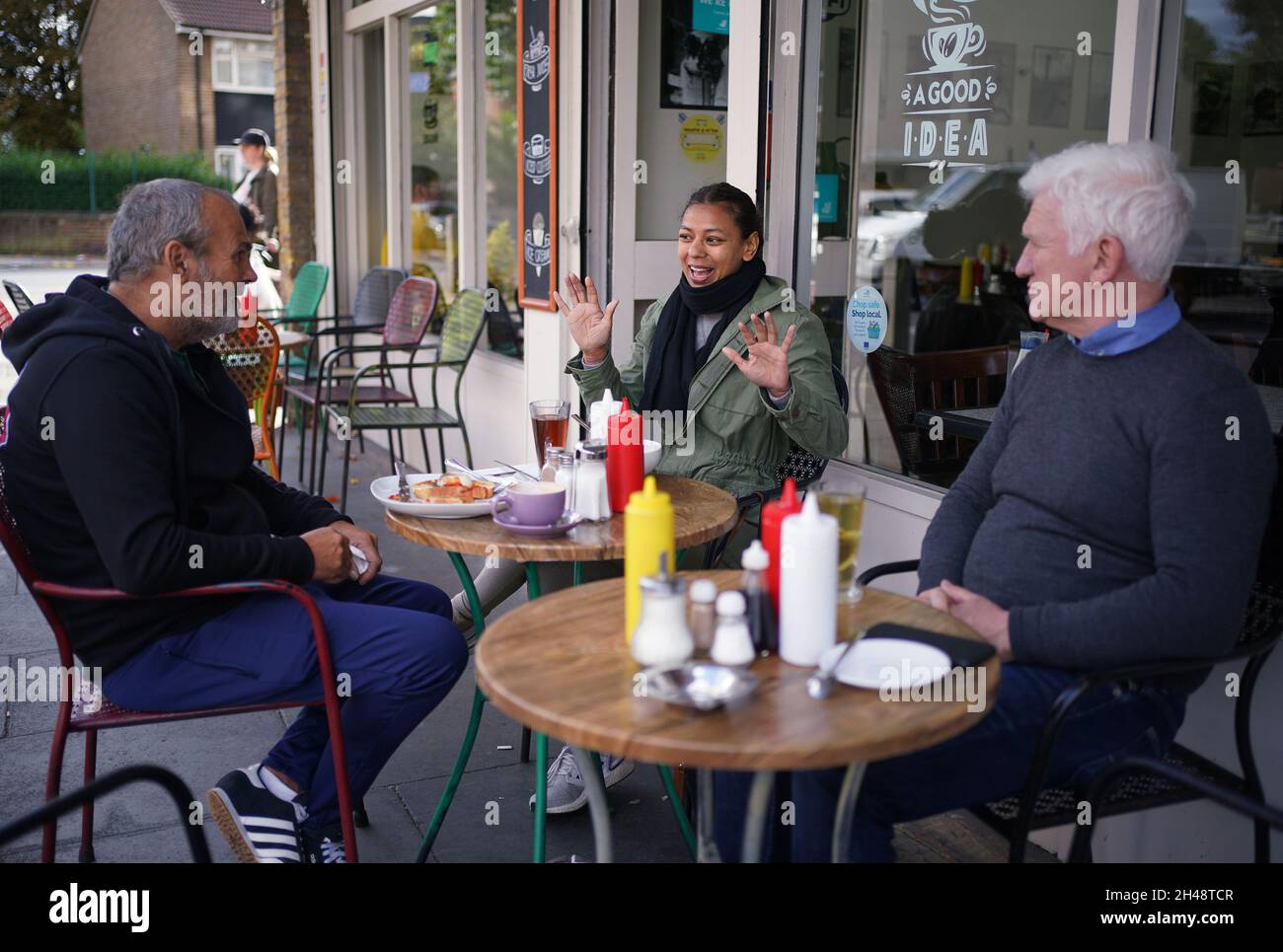 British professional boxer Ruqsana Begum unwinds with her coaching team ...