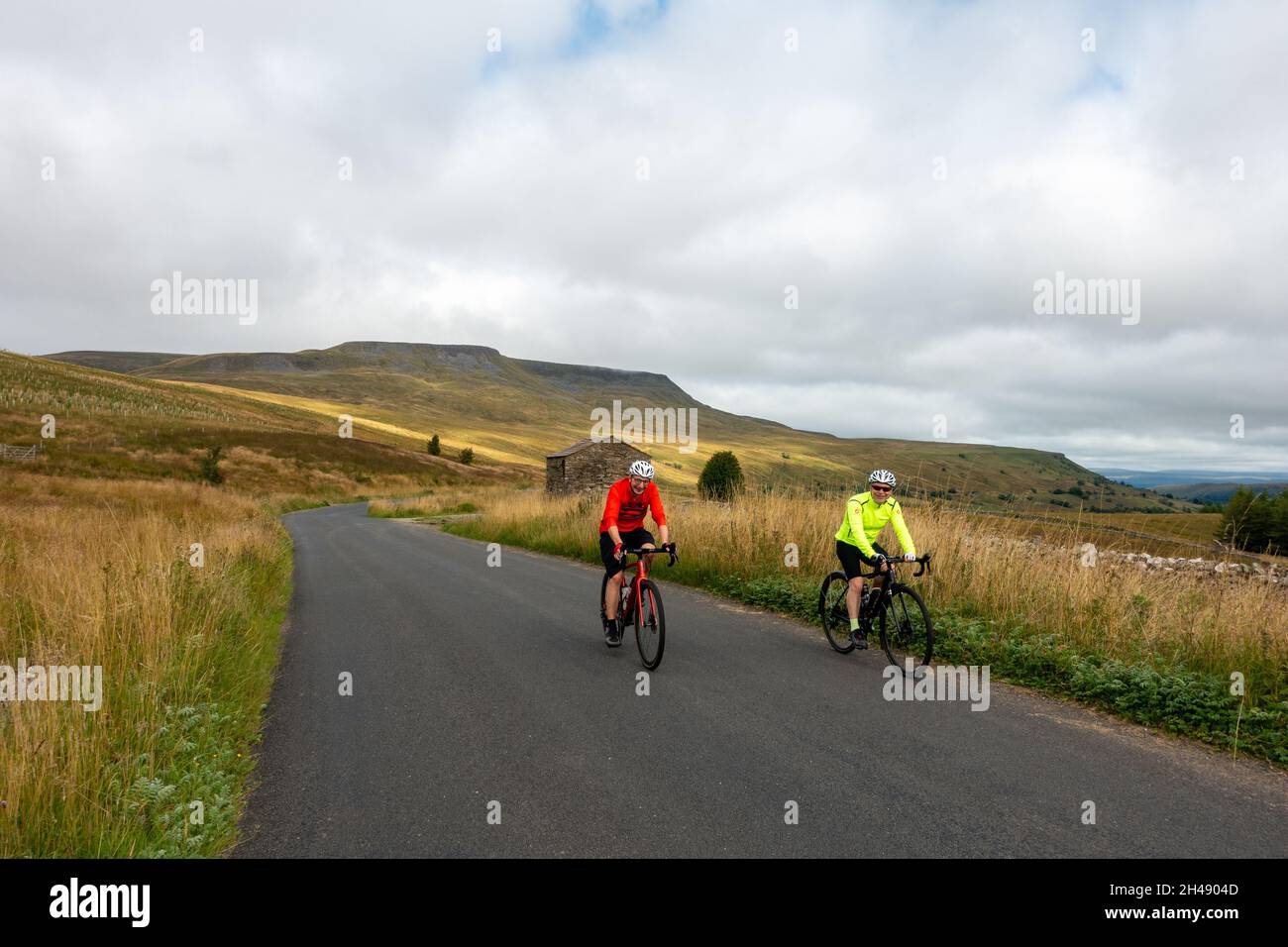 Two men riding High Resolution Stock Photography and Images - Alamy