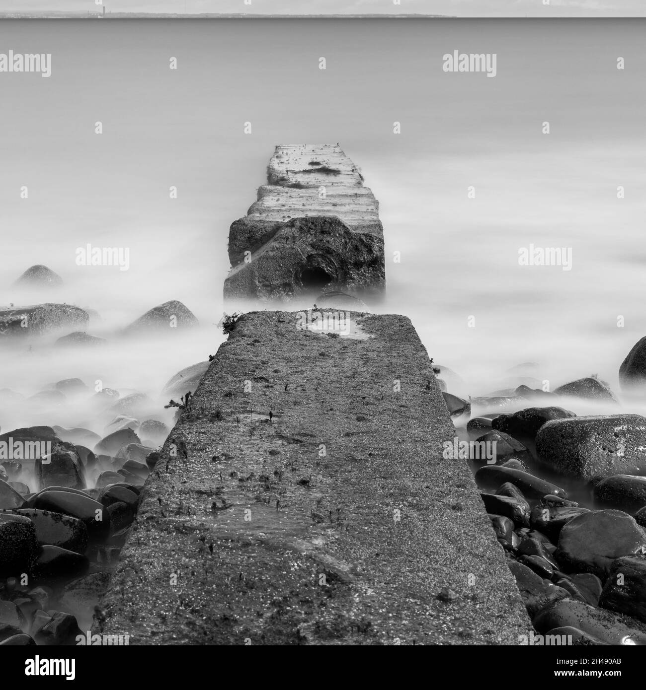 Long Exposure Sea and Rocks Stock Photo - Alamy