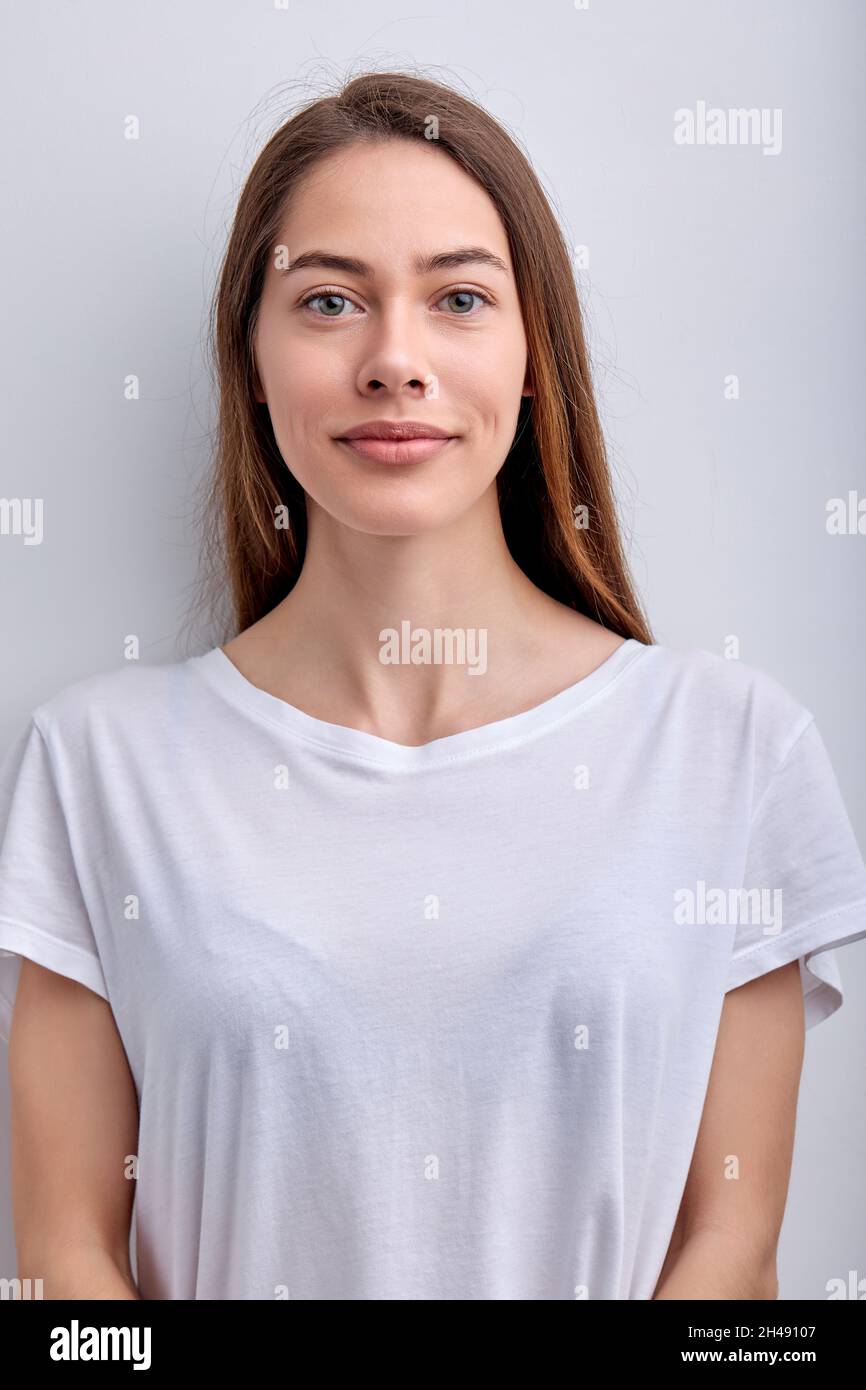 Calm Diligent Female With Natural Long Hair In Casual T-shirt Posing ...