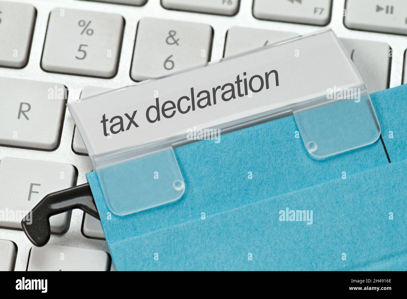 blue hanging file for tax declaration Stock Photo - Alamy