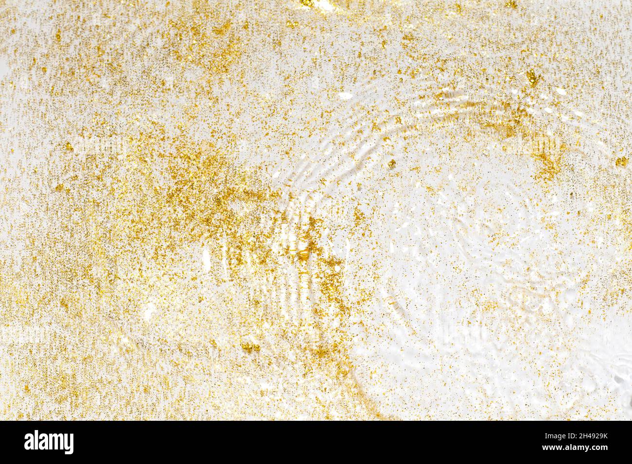 Gold water texture hi-res stock photography and images - Alamy
