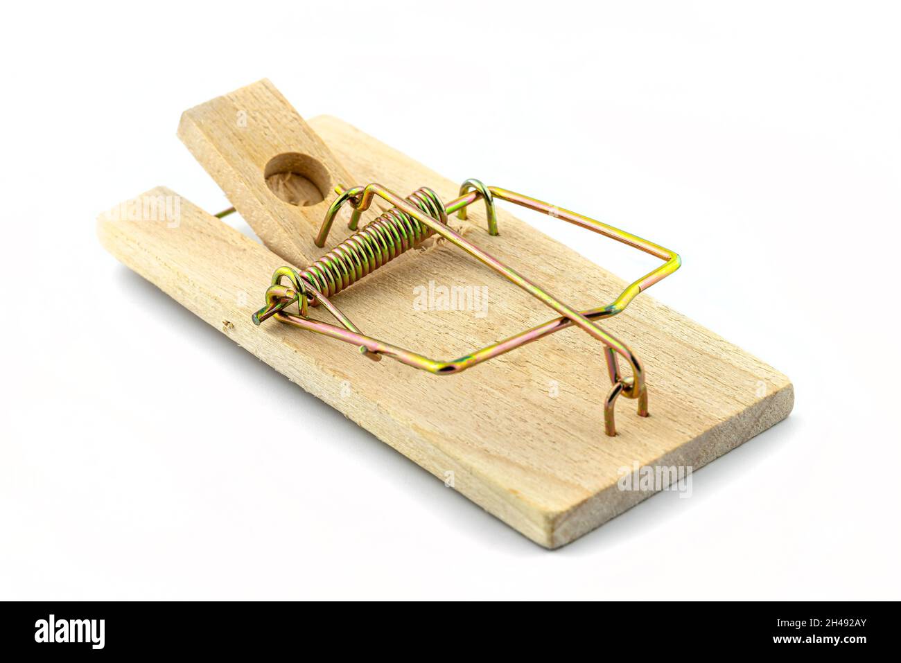Macro photo of a spring loaded mousetrap, isolated on a white ...