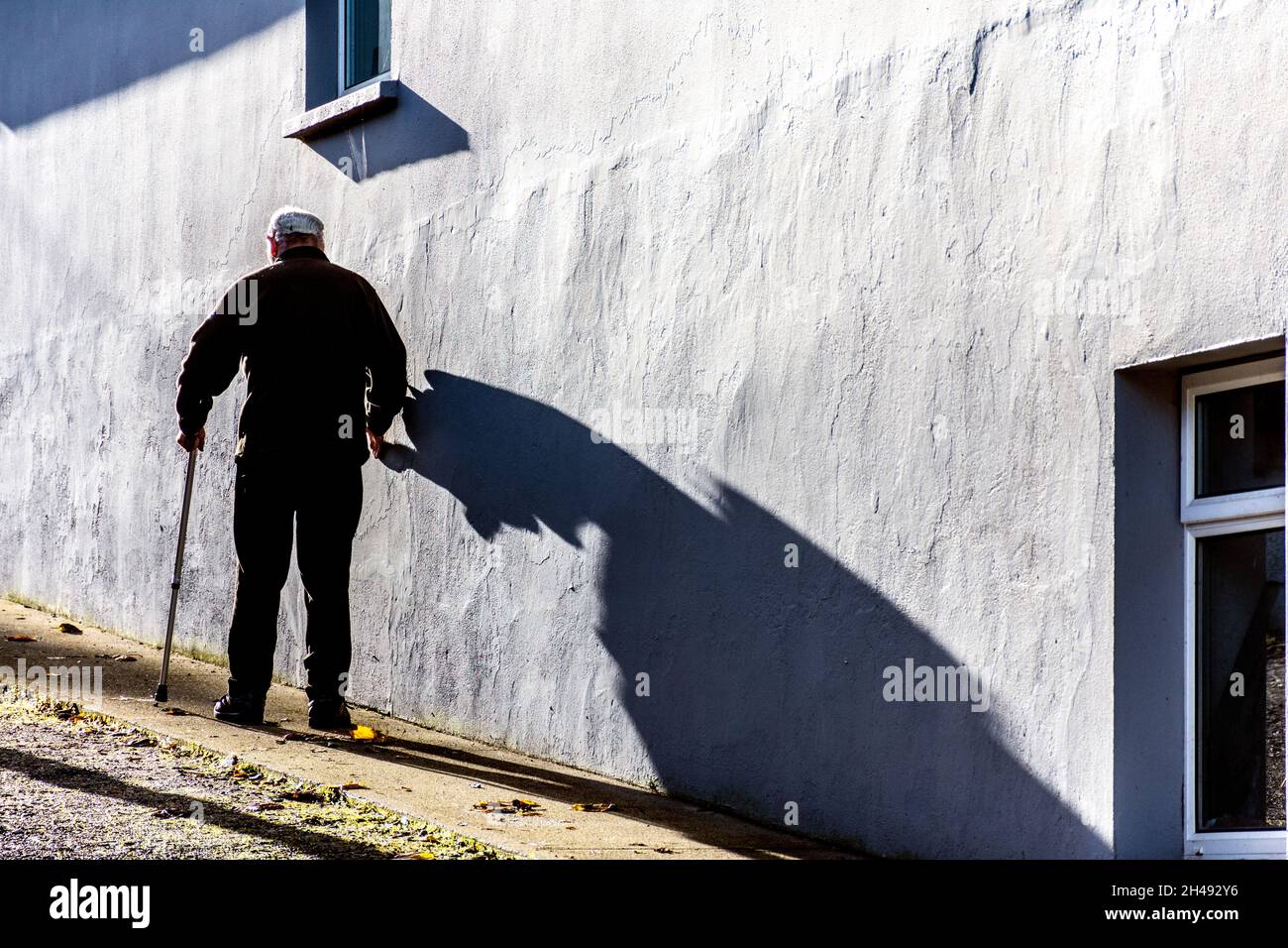 Shadow old man walking stick hi-res stock photography and images - Alamy