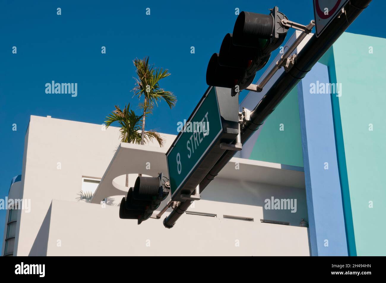 Street sign " 8 street" in Miami beach with a traffic light, in the ...