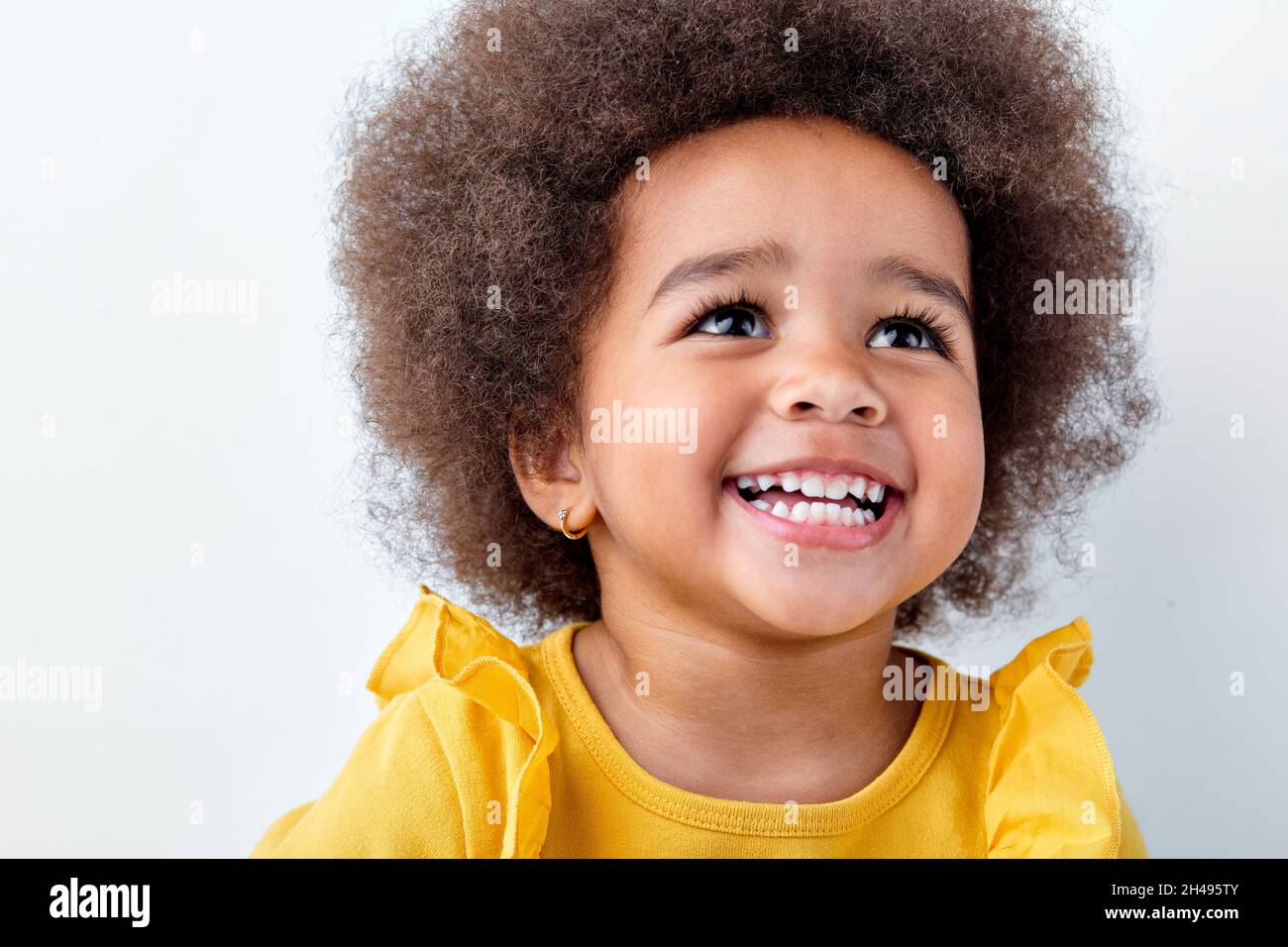 close-up portrait of an adorable, awesome black african girl laughing ...