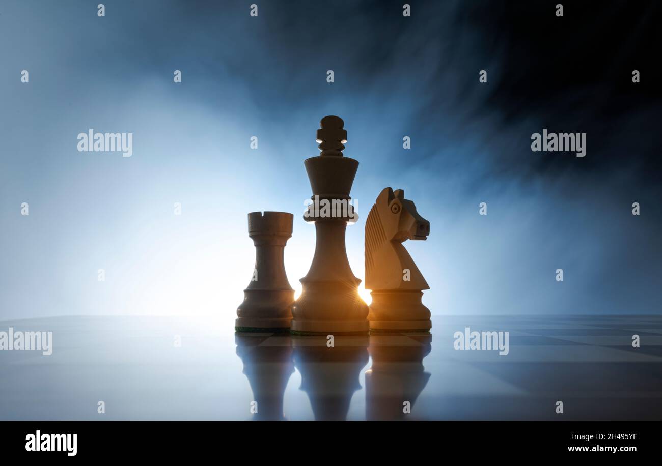 Chess pieces on the chessboard with smoke: challenge and competition ...