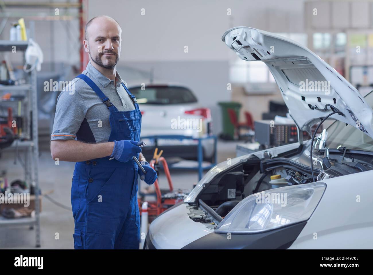 Mechanic posing hi-res stock photography and images - Alamy