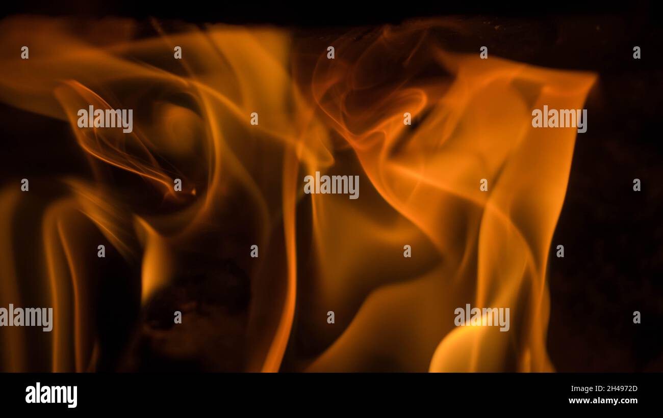 Yellow Fire inside a Fire place Stock Photo - Alamy