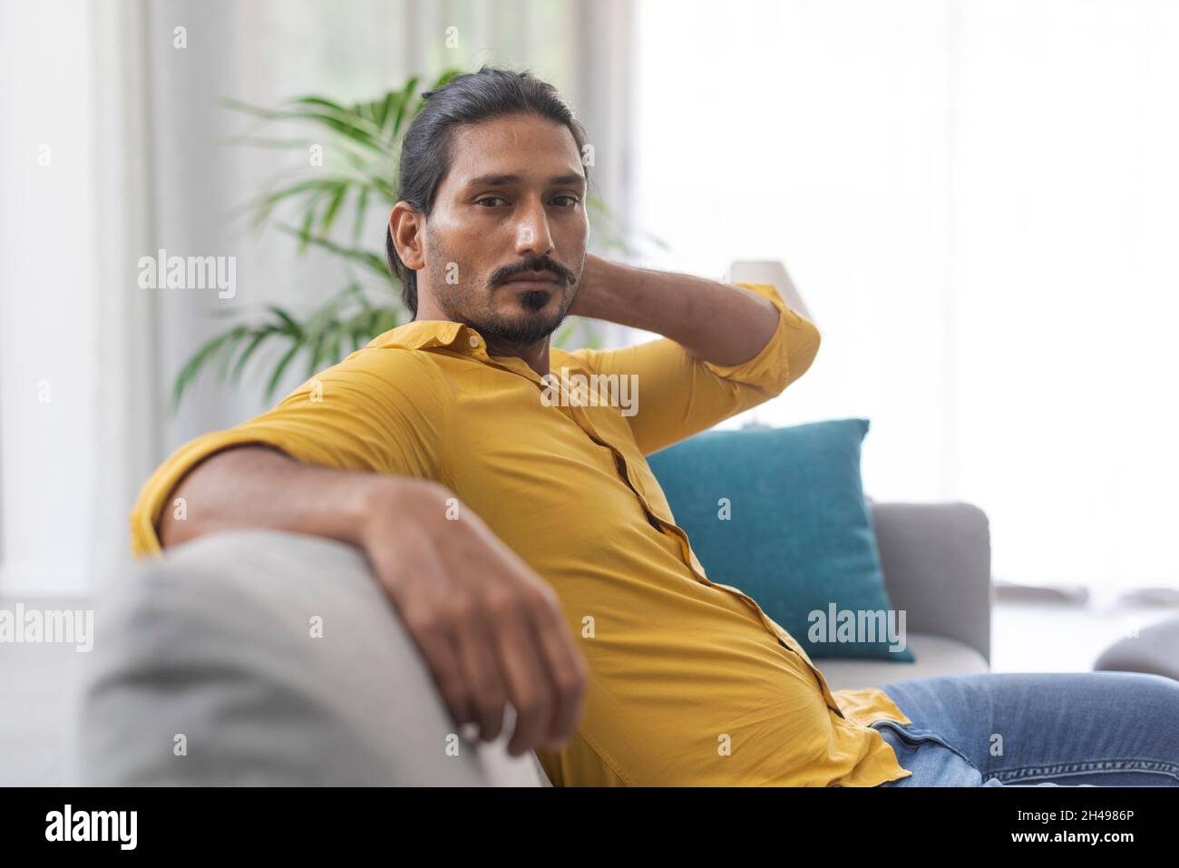 Man sitting sprawled hi-res stock photography and images - Alamy