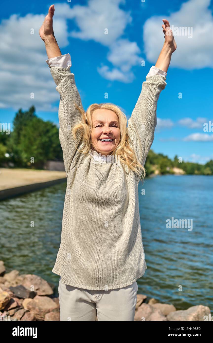 Woman hands up air hi-res stock photography and images - Alamy