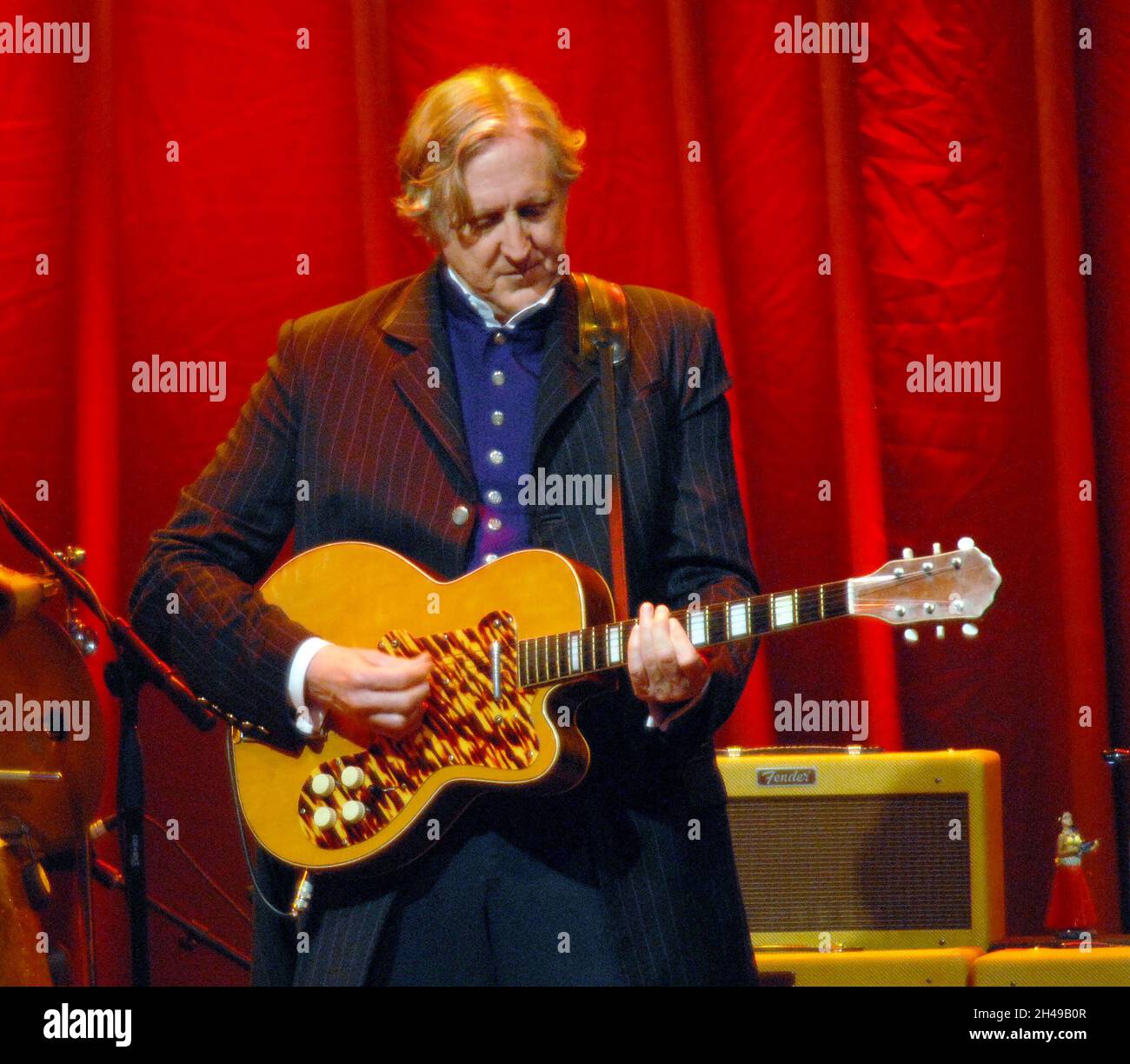 JULY 10: T. Bone Burnette performs during the Raising Sand Tour at ...