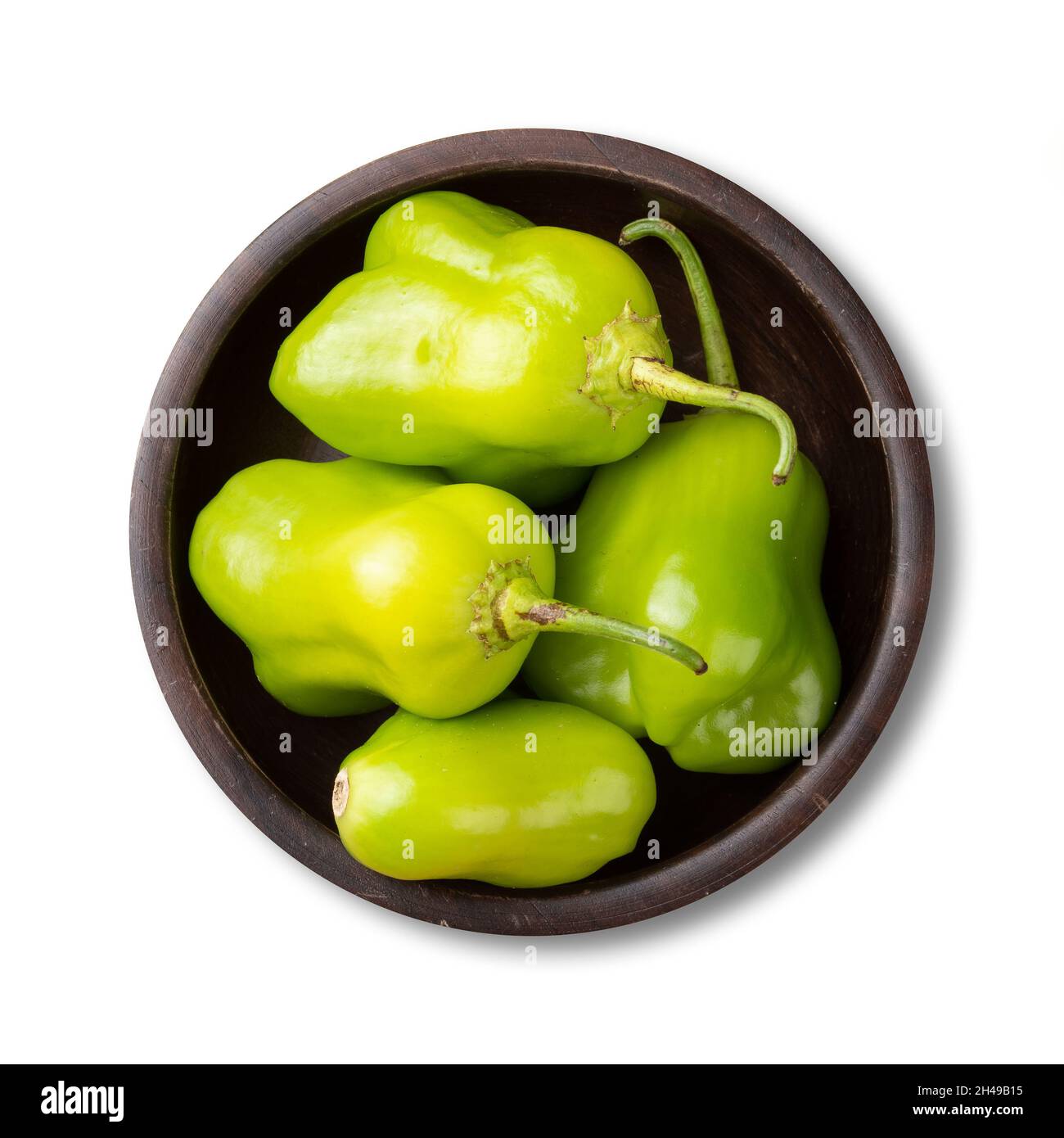 Green cambuci pepper, brazilian cuisine ingredient, on a bowl isolated ...
