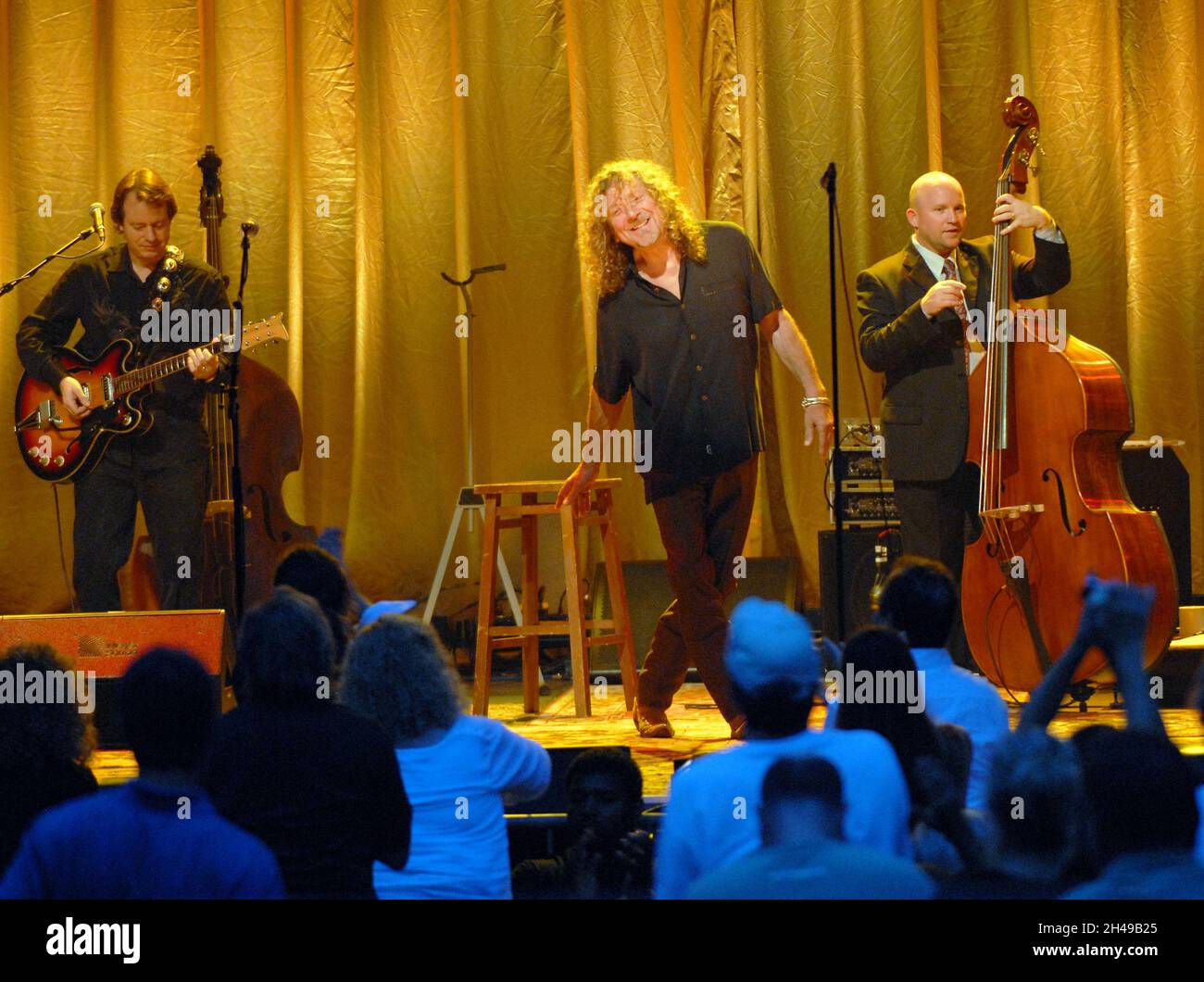 JULY 10: Stuart Duncan, Robert Plant, and Dennis Crouch perform during ...