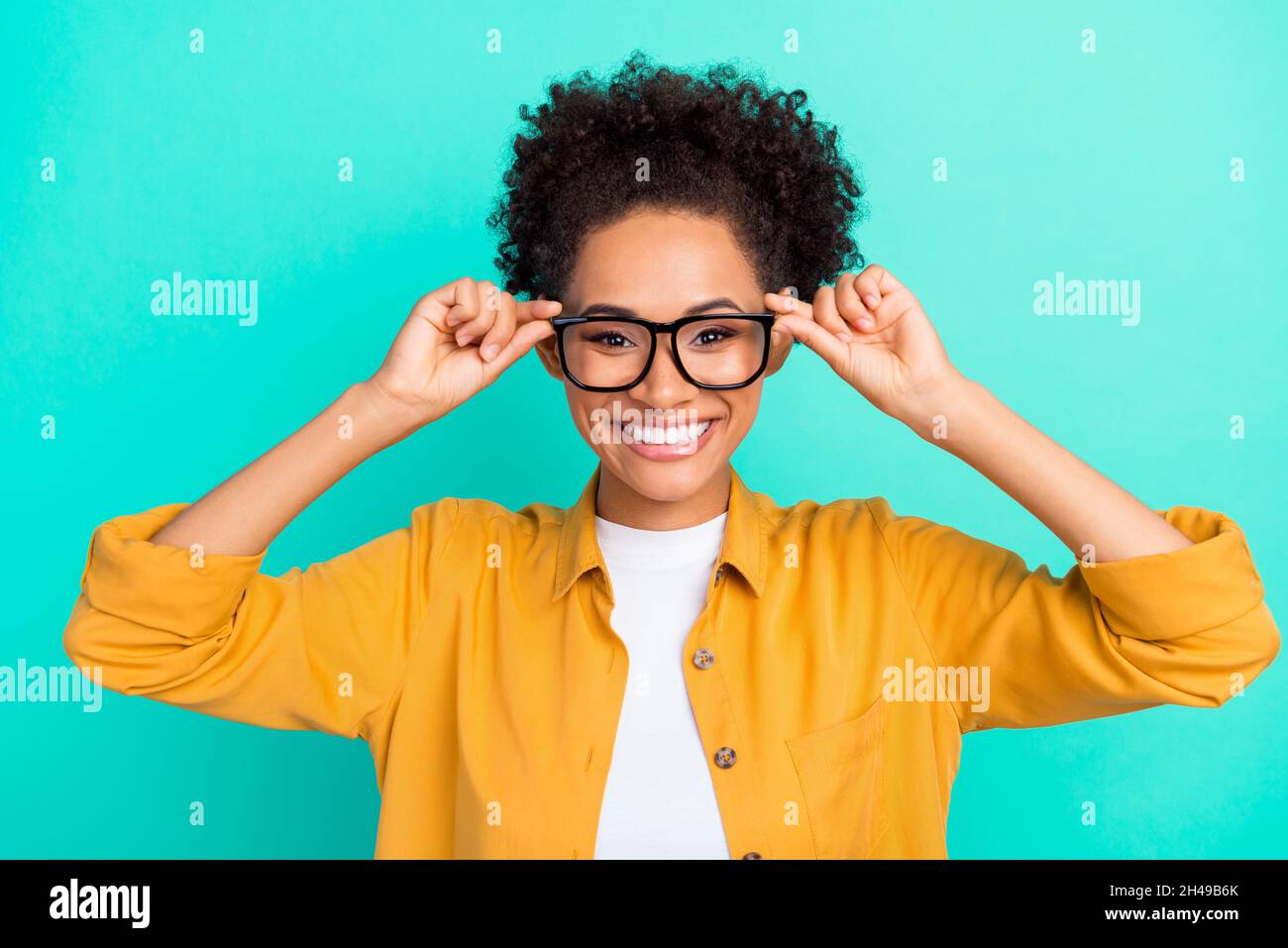 Portrait of attractive intellectual cheerful girl touching specs good ...