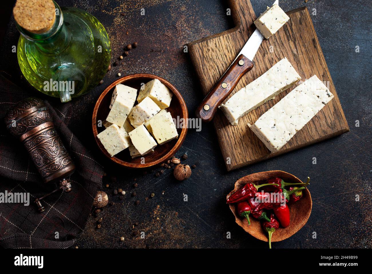 Fresh tofu on board, an alternative to meat protein. Vegetarian cuisine ...