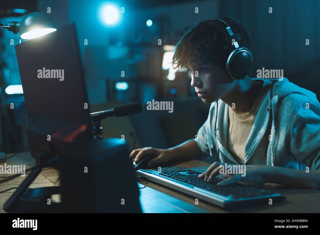 Cool teenager, computer hi-res stock photography and images - Alamy