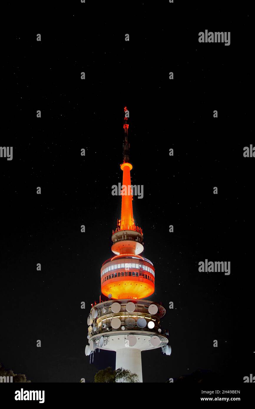 Colorful lights of the Telstra Tower in Canberra Nightscape Stock Photo ...