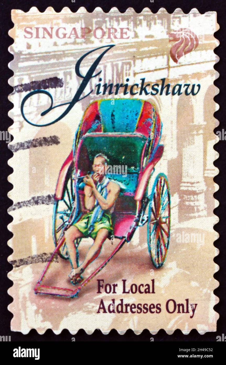 SINGAPORE - CIRCA 1997: a stamp printed in Singapore shows rickshaw, a ...