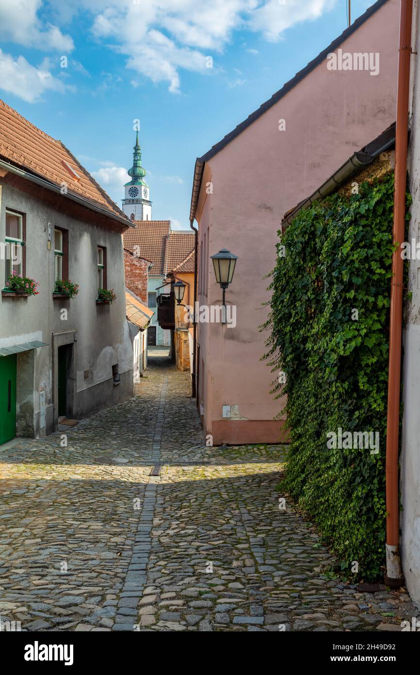 Narrow picturesque street with colorful buildings in historic center in ...