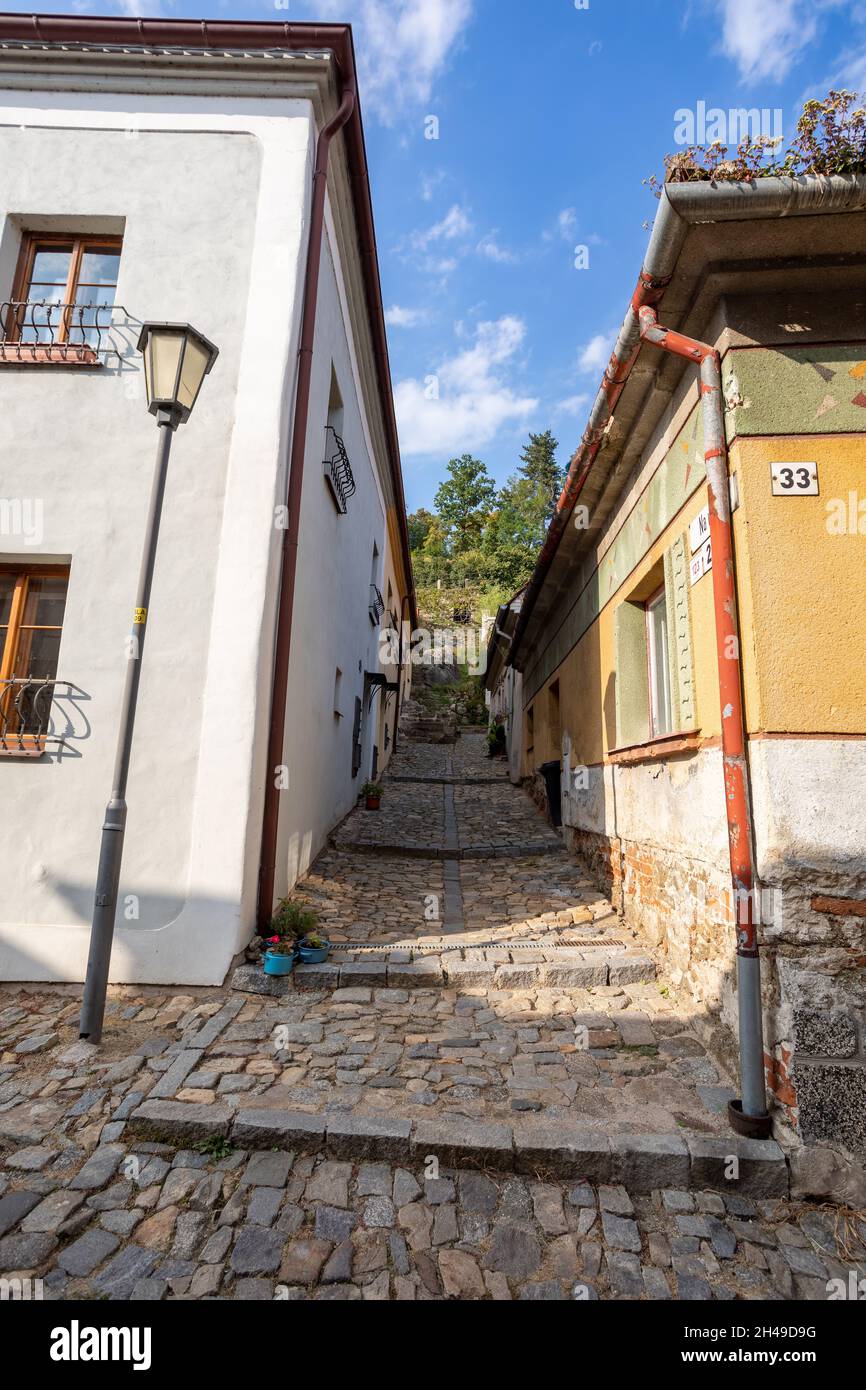 Narrow picturesque street with colorful buildings in historic center in ...