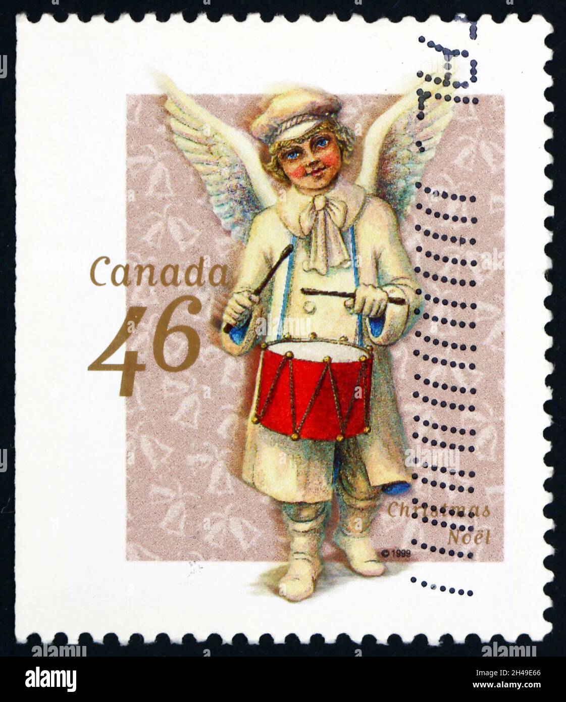 CANADA - CIRCA 1999: a stamp printed in Canada shows angel and drum ...