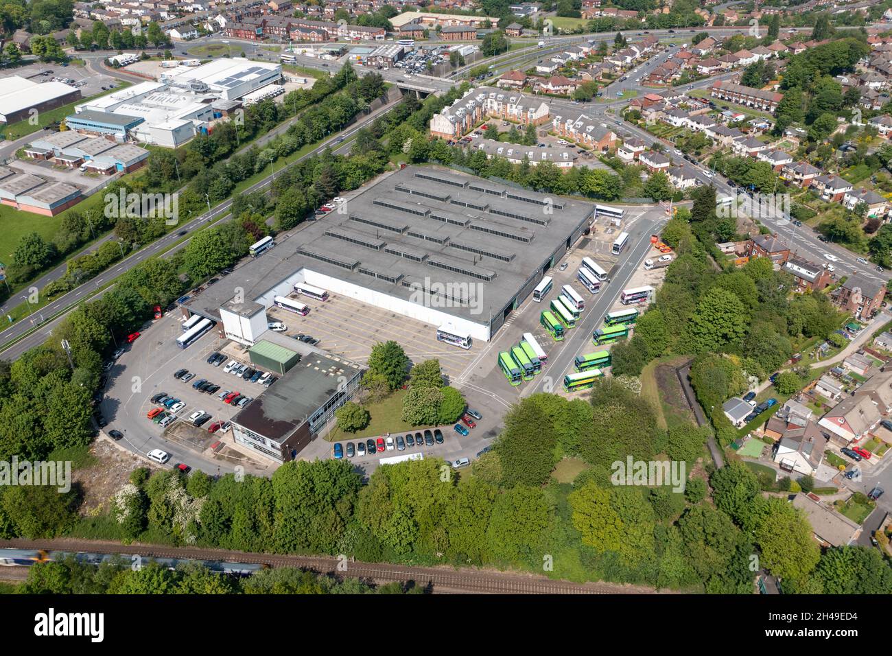 Aerial photo of the town of Bramley in Leeds UK showing the main bus ...
