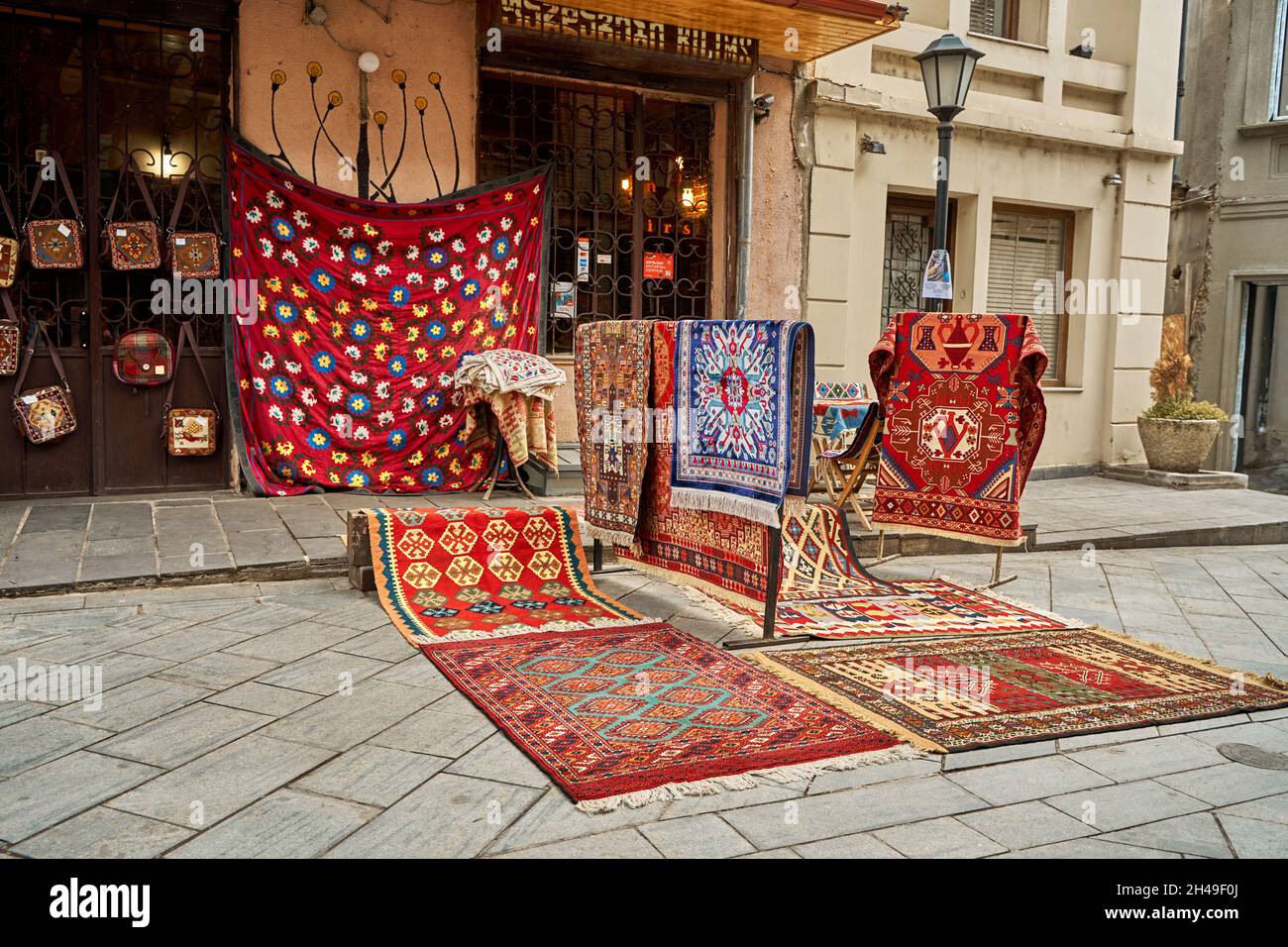 Street counter of traditional carpets on the street in Tbilisi Stock ...