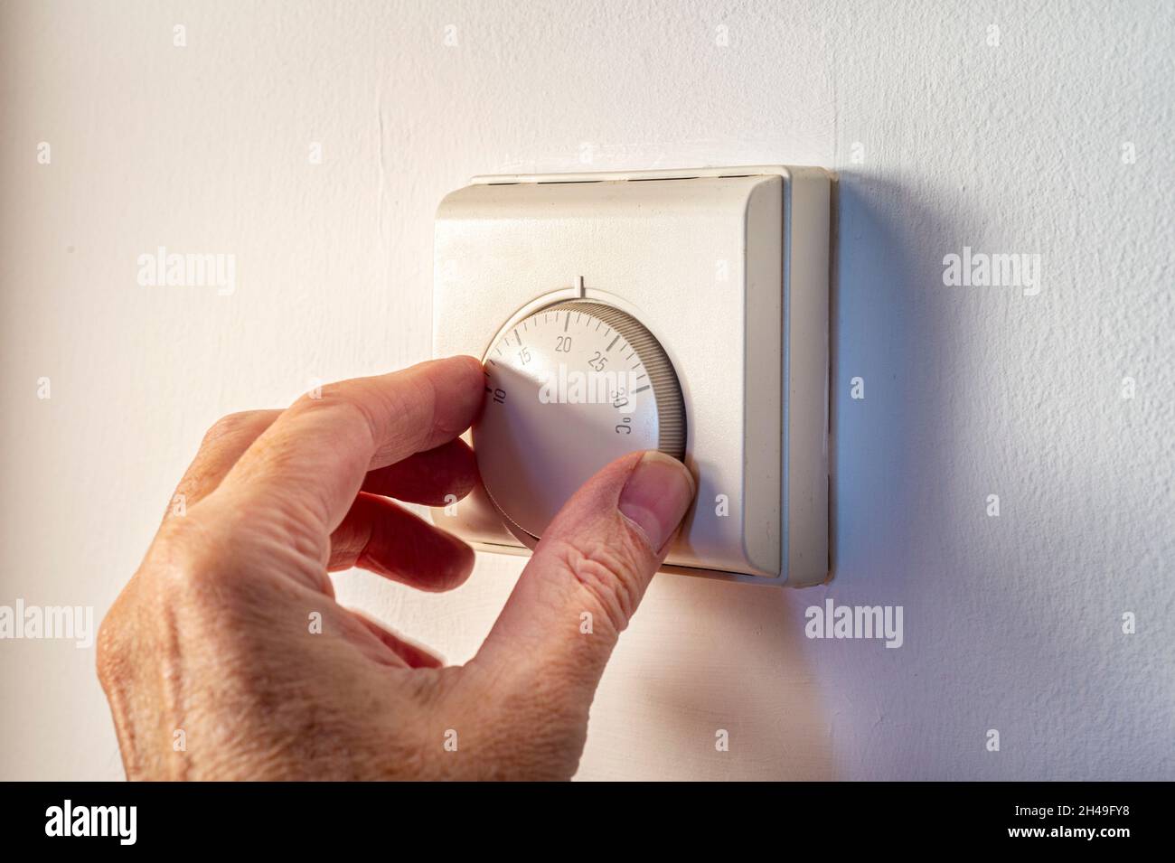 Wall mounted thermostat hi-res stock photography and images - Alamy
