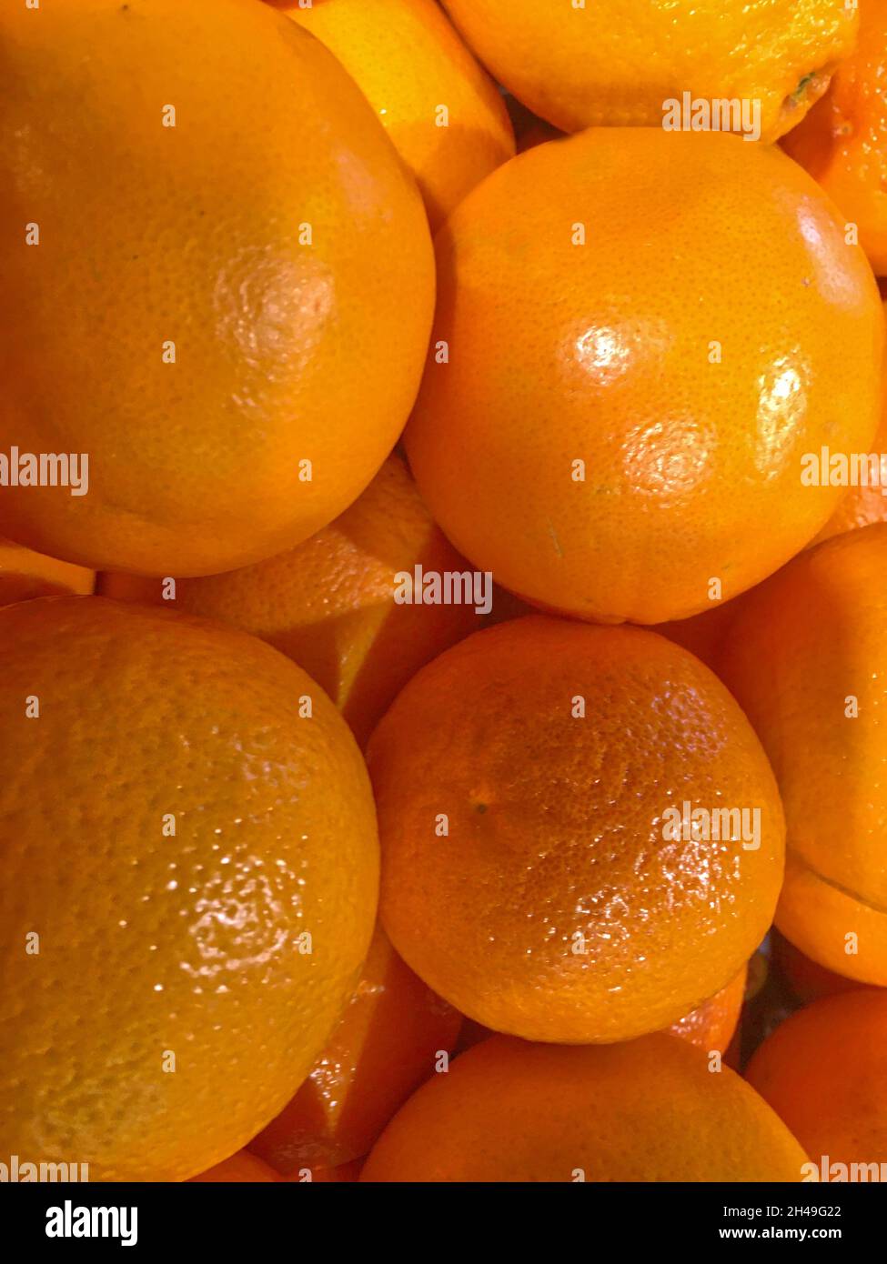 Bunch of fresh Florida oranges on a black background in Georgia Stock ...