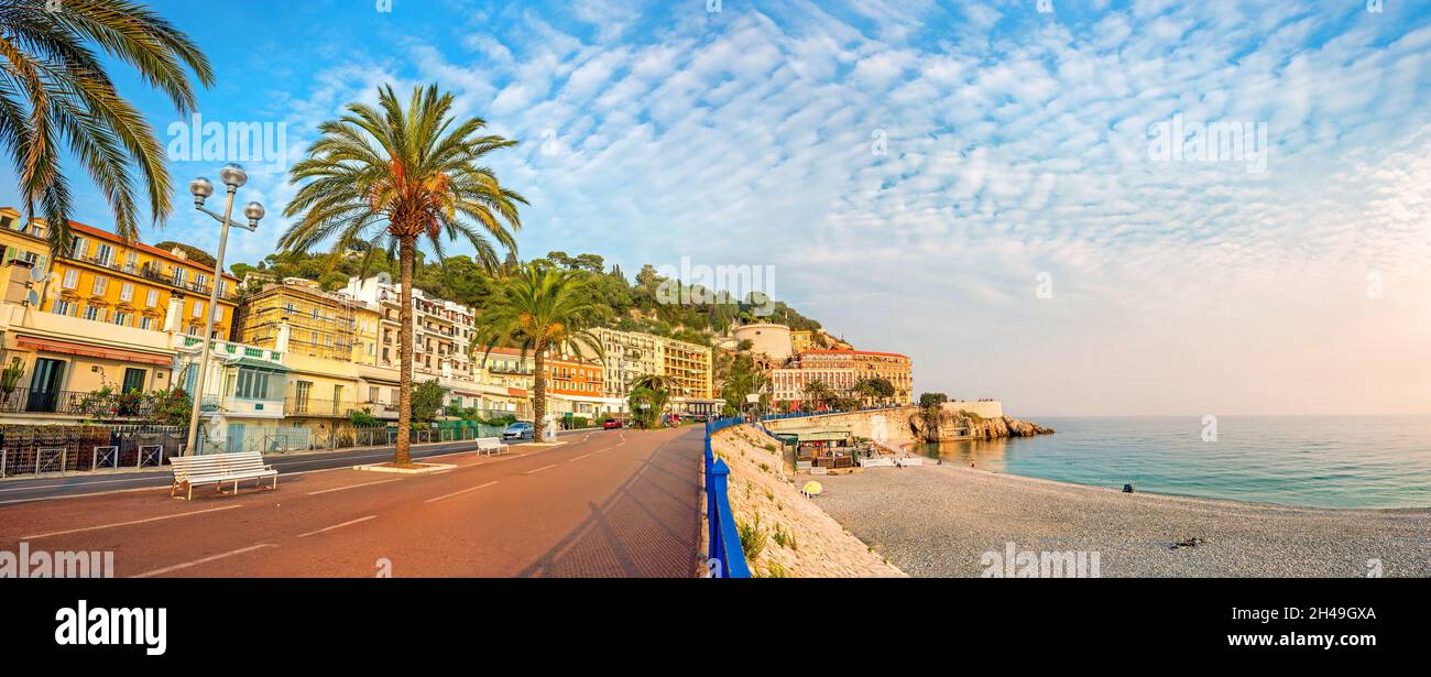 Panoramic view of beach and Promenade des Anglais at sunset in Nice ...
