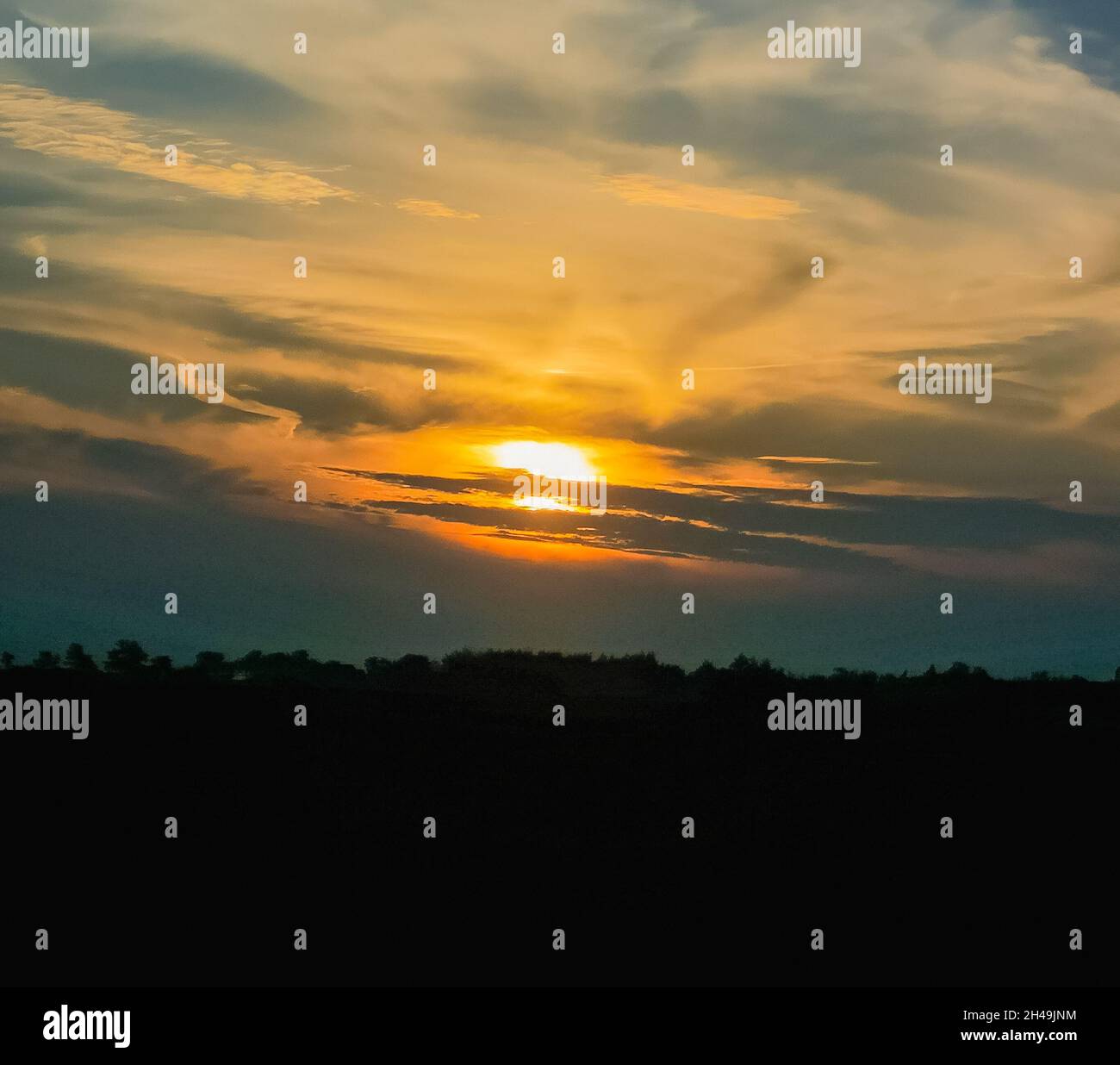 Hiding the sun behind clouds hi-res stock photography and images - Alamy