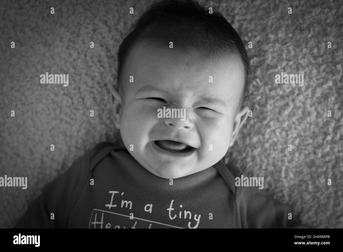 Baby born screaming Black and White Stock Photos & Images - Alamy