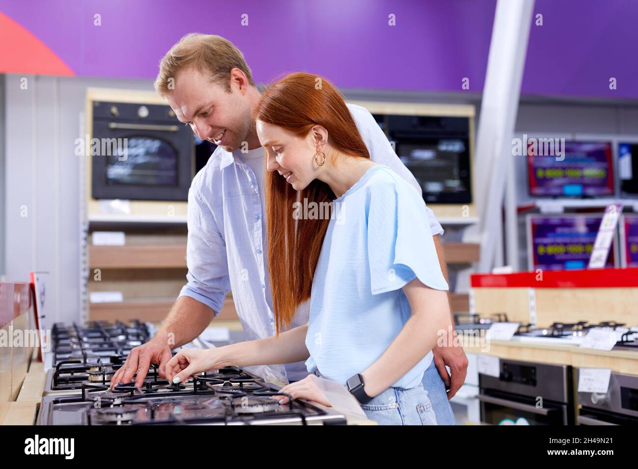 Customer buying electrical products hi-res stock photography and images ...